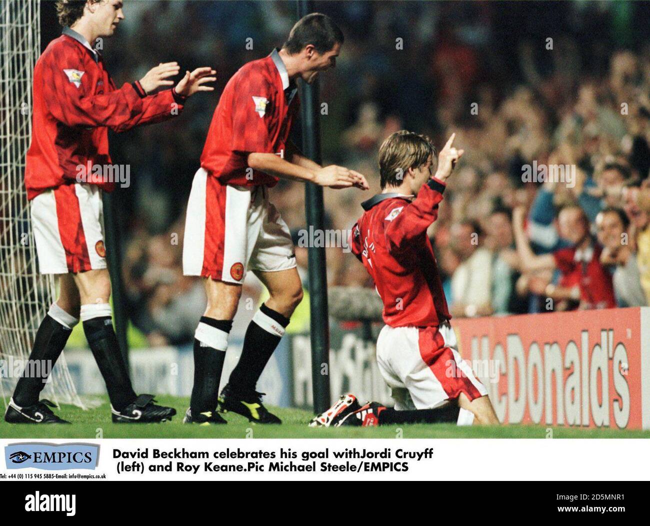 David Beckham celebrates his goal with Jordi Cruyff (left) and Roy ...