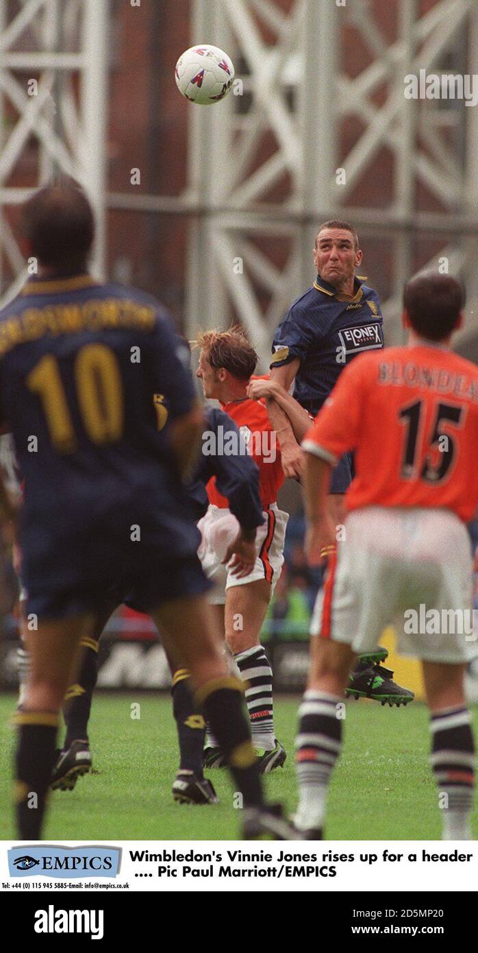 Wimbledon's Vinnie Jones rises up for a header Stock Photo - Alamy