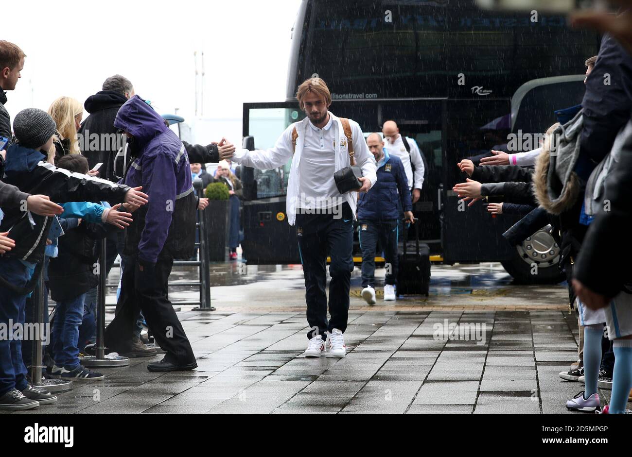 Manchester City's Aleix Garcia Serrano greets fans upon arriving at the ...