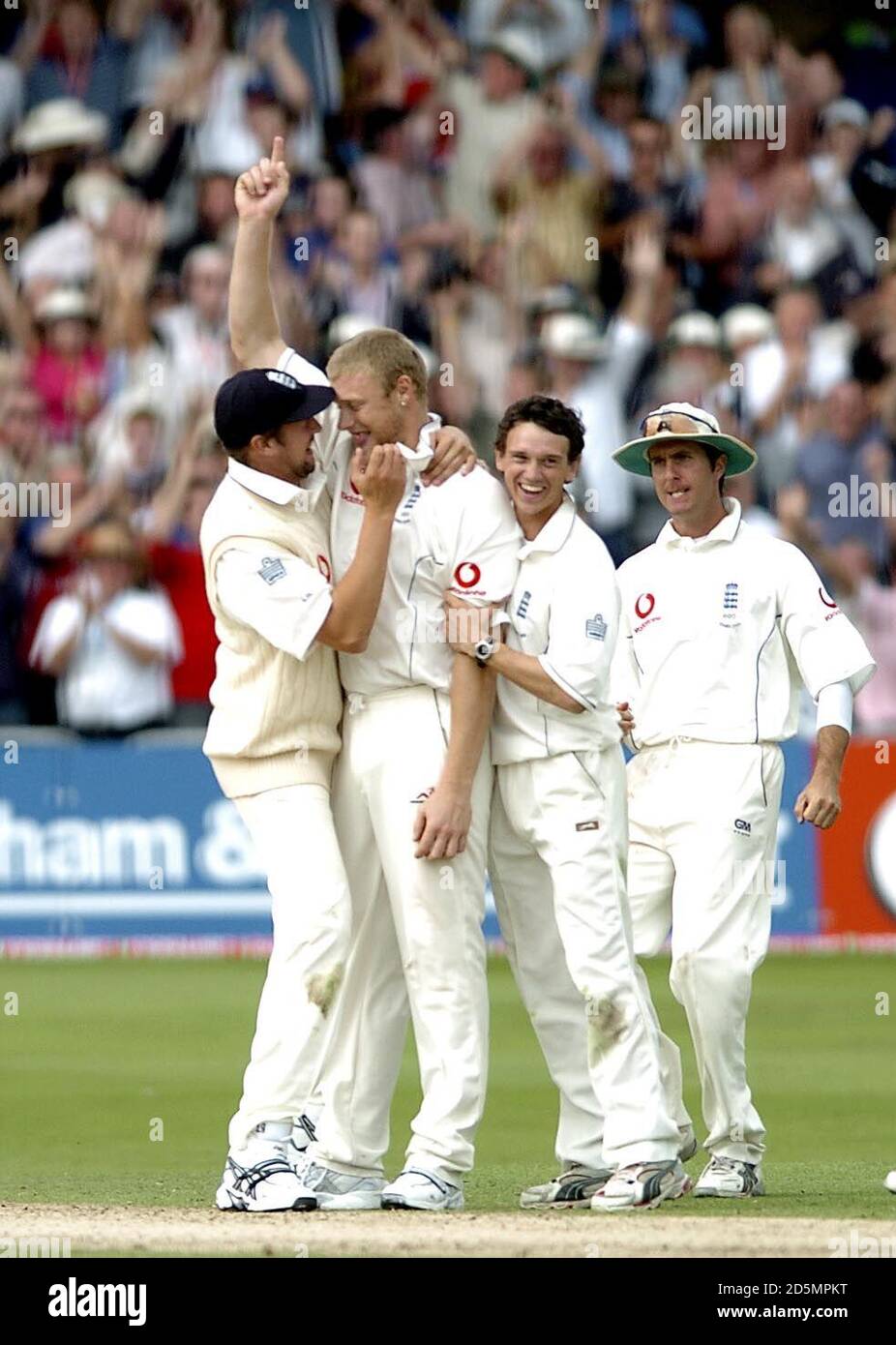 England's Andrew Flintoff celebrates with teamates after claiming the ...