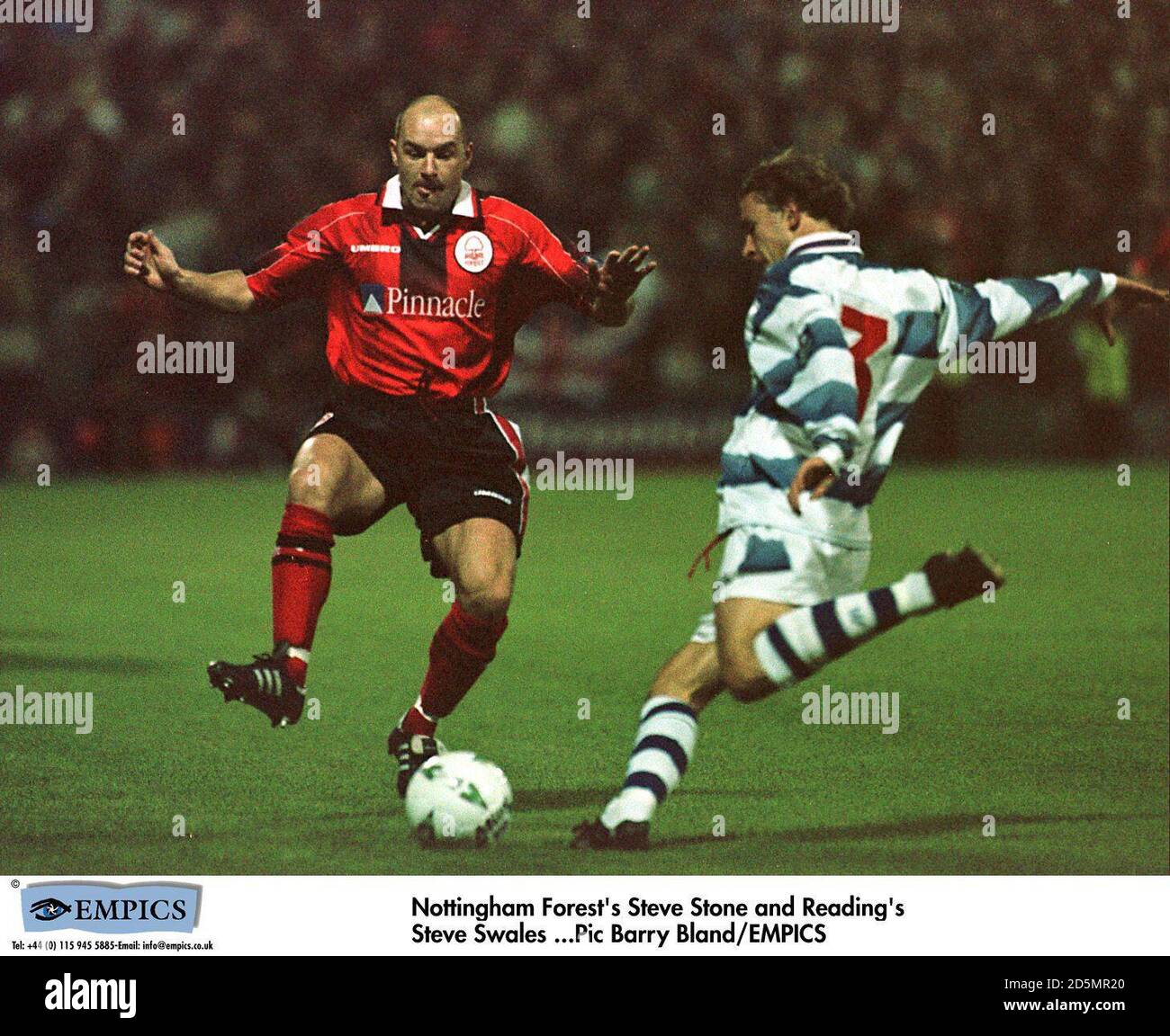 Nottingham Forest's Steve Stone (left) tries to block the clearance ...