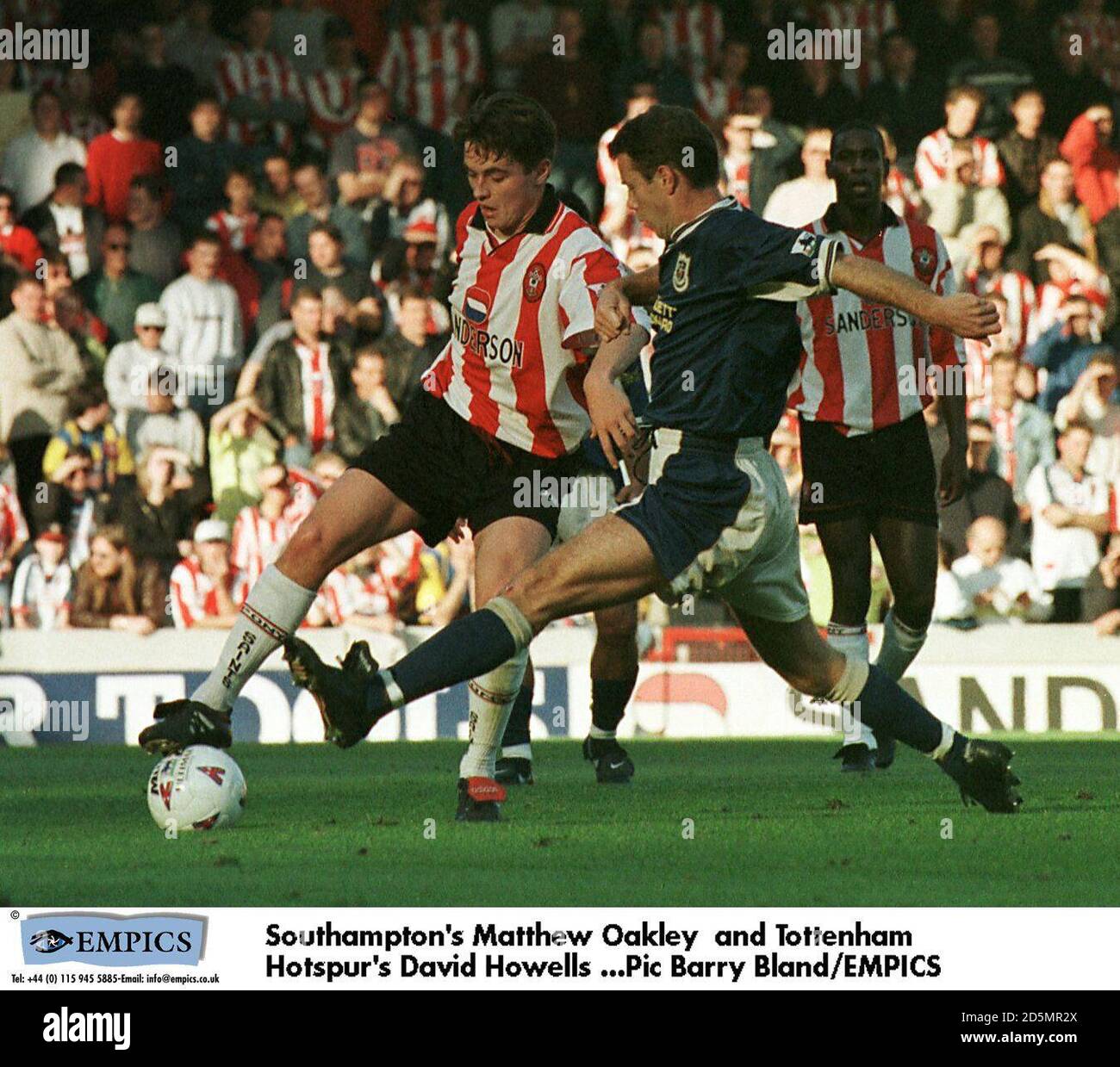Southampton's Matthew Oakley (left) is blocked by Tottenham Hotspur's ...