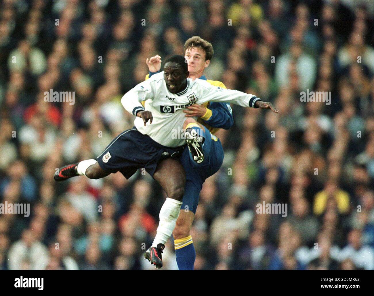 Ruel Fox of Tottenham Hotspur (left) clashes with David Robertson of ...