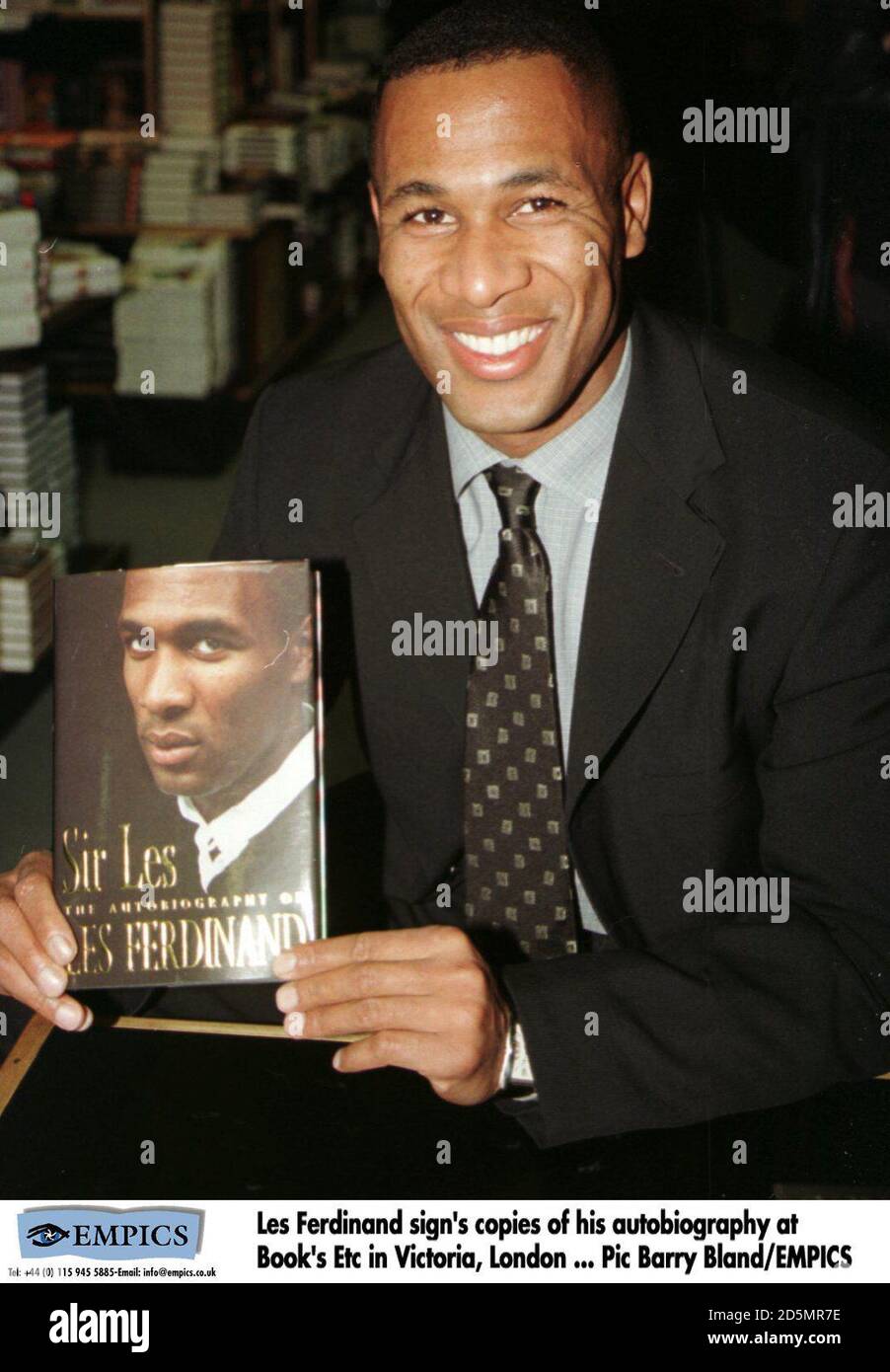 Les Ferdinand with a copy of his autobiography Stock Photo - Alamy