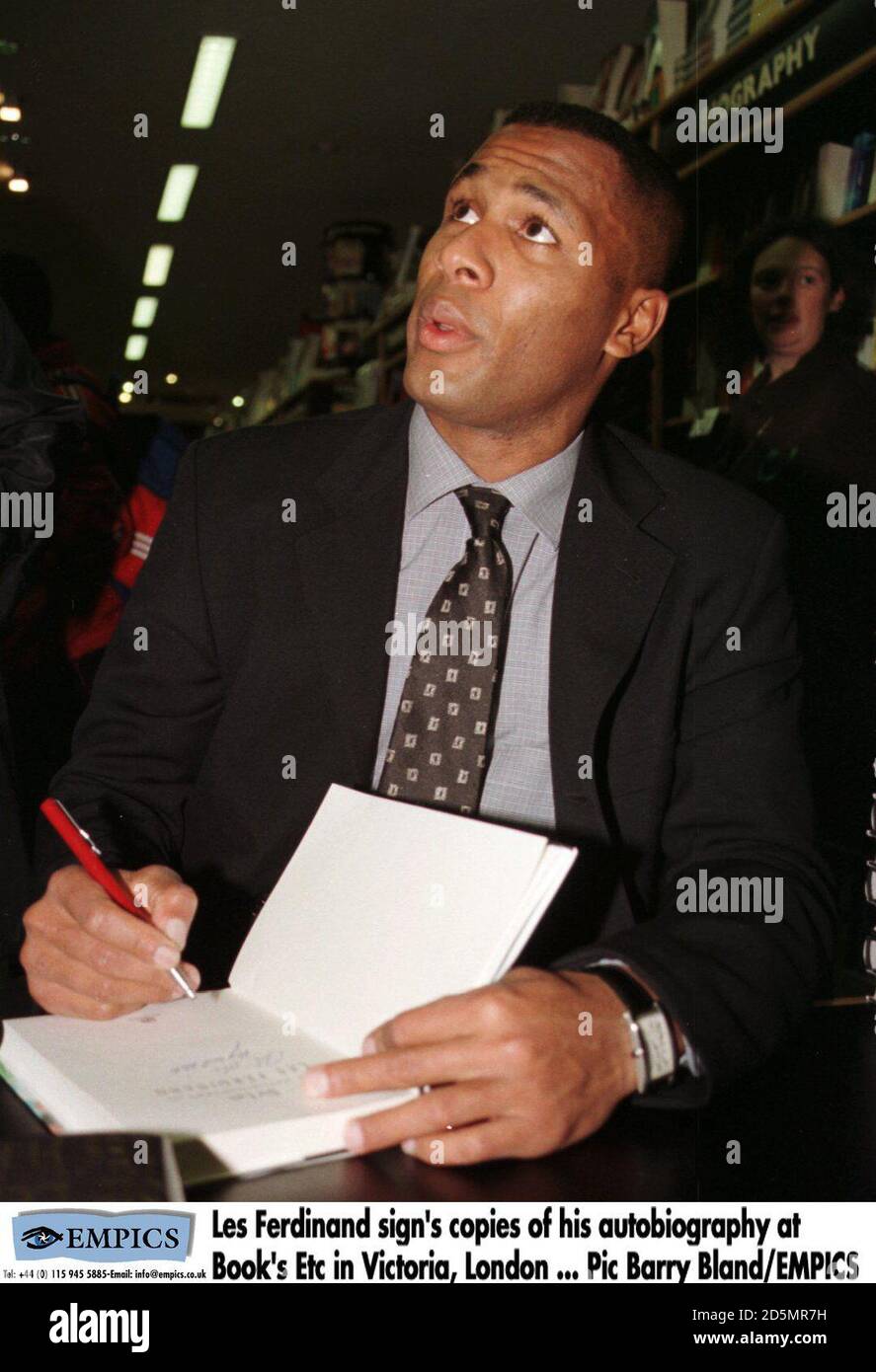Les Ferdinand signs a copy of his autobiography Stock Photo - Alamy