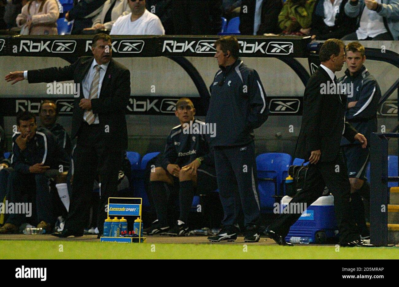 Bolton Wanderers manager Sam Allardyce signals to his opposite number ...