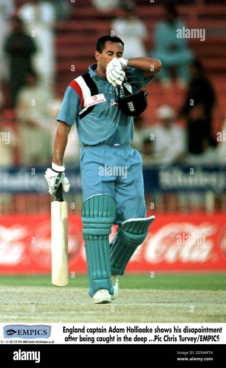 England captain Adam Hollioake shows his disappointment after being ...