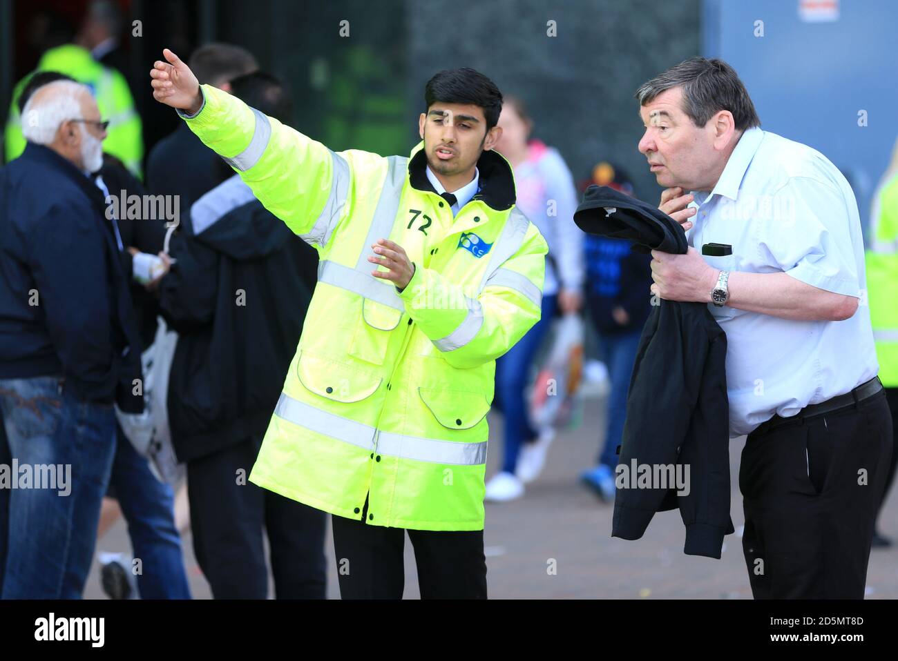 Manchester United fans evacuated from Old Trafford by security, police ...