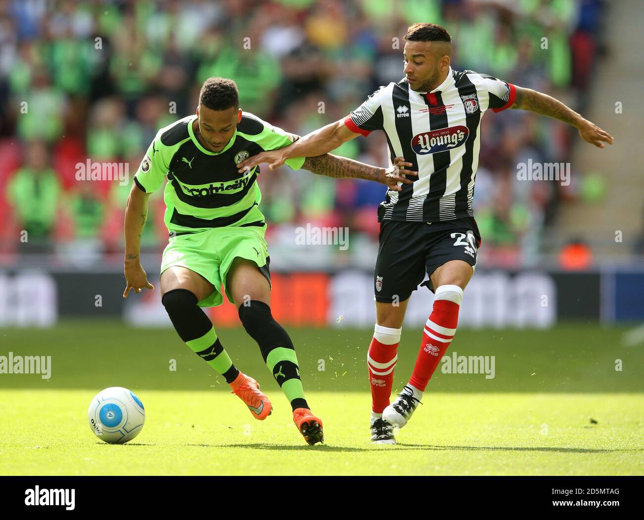 Forest Green Rovers' Keanu Marsh-Brown (left) and Grimsby Town's Nathan ...