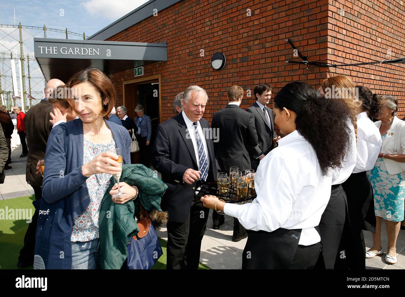 Guests on the terrace garden of the Peter May Stand Stock Photo - Alamy