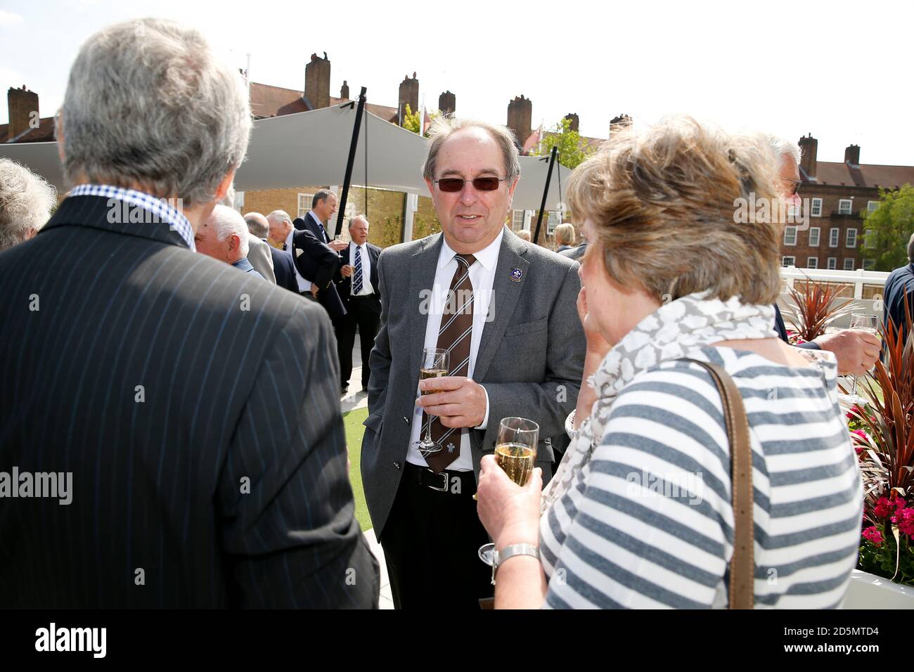 Guests on the terrace garden of the Peter May Stand Stock Photo - Alamy