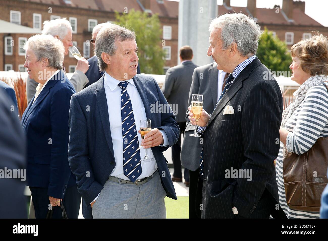 Guests on the terrace garden of the Peter May Stand Stock Photo - Alamy