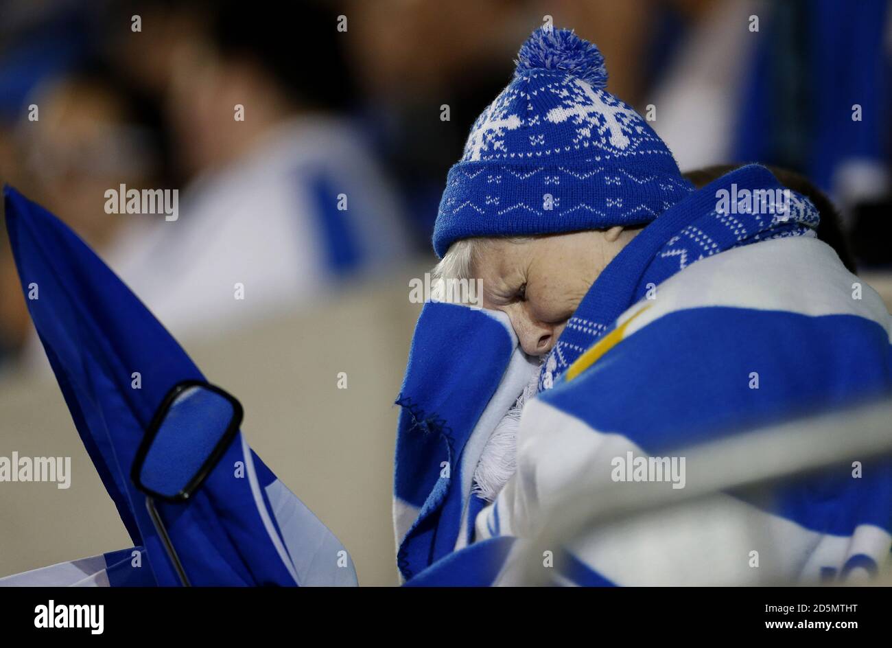A Brighton and Hove Albion fan crying during the game Stock Photo - Alamy