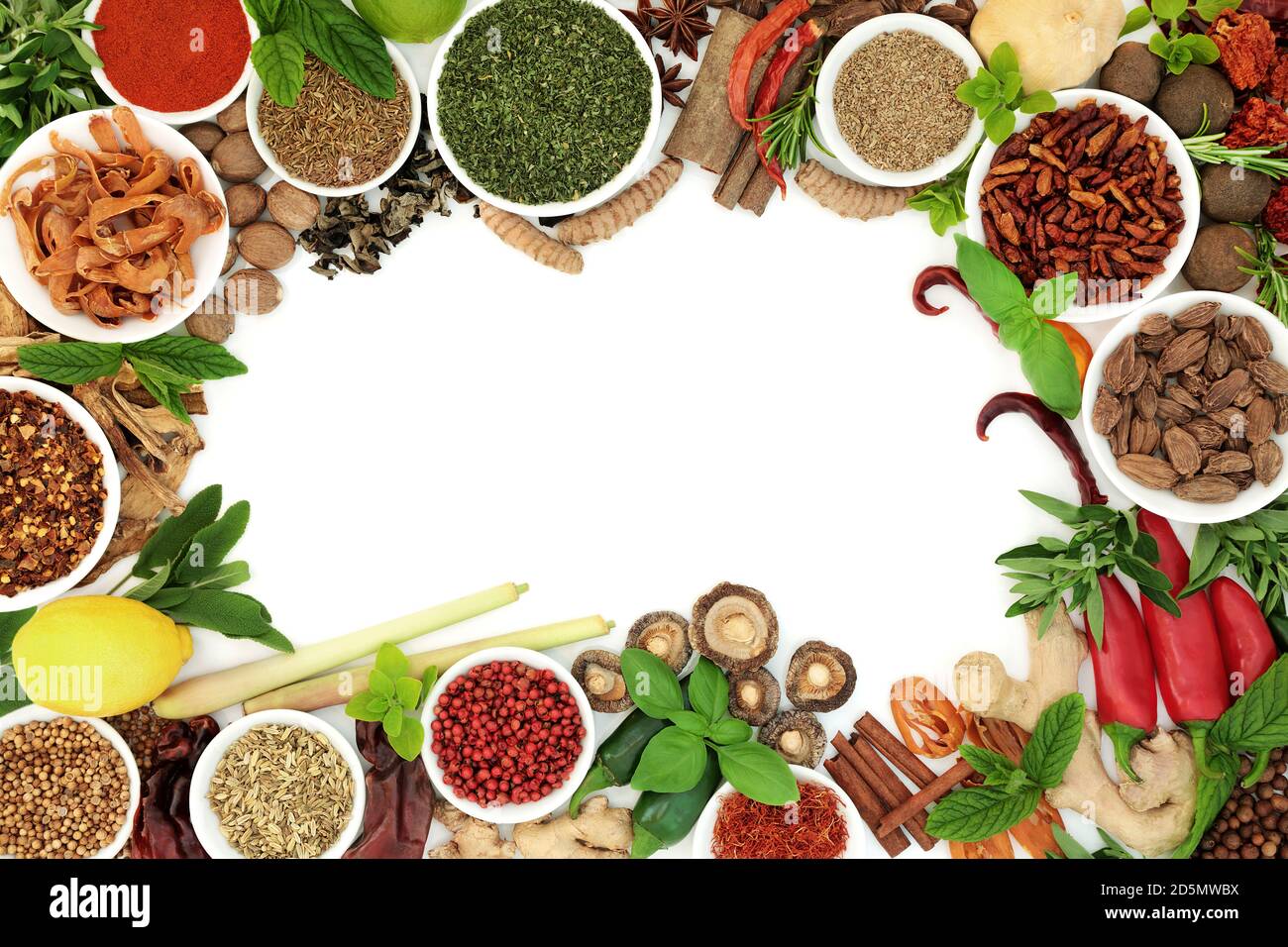 Herb and spice seasoning background border on white with copy space ...