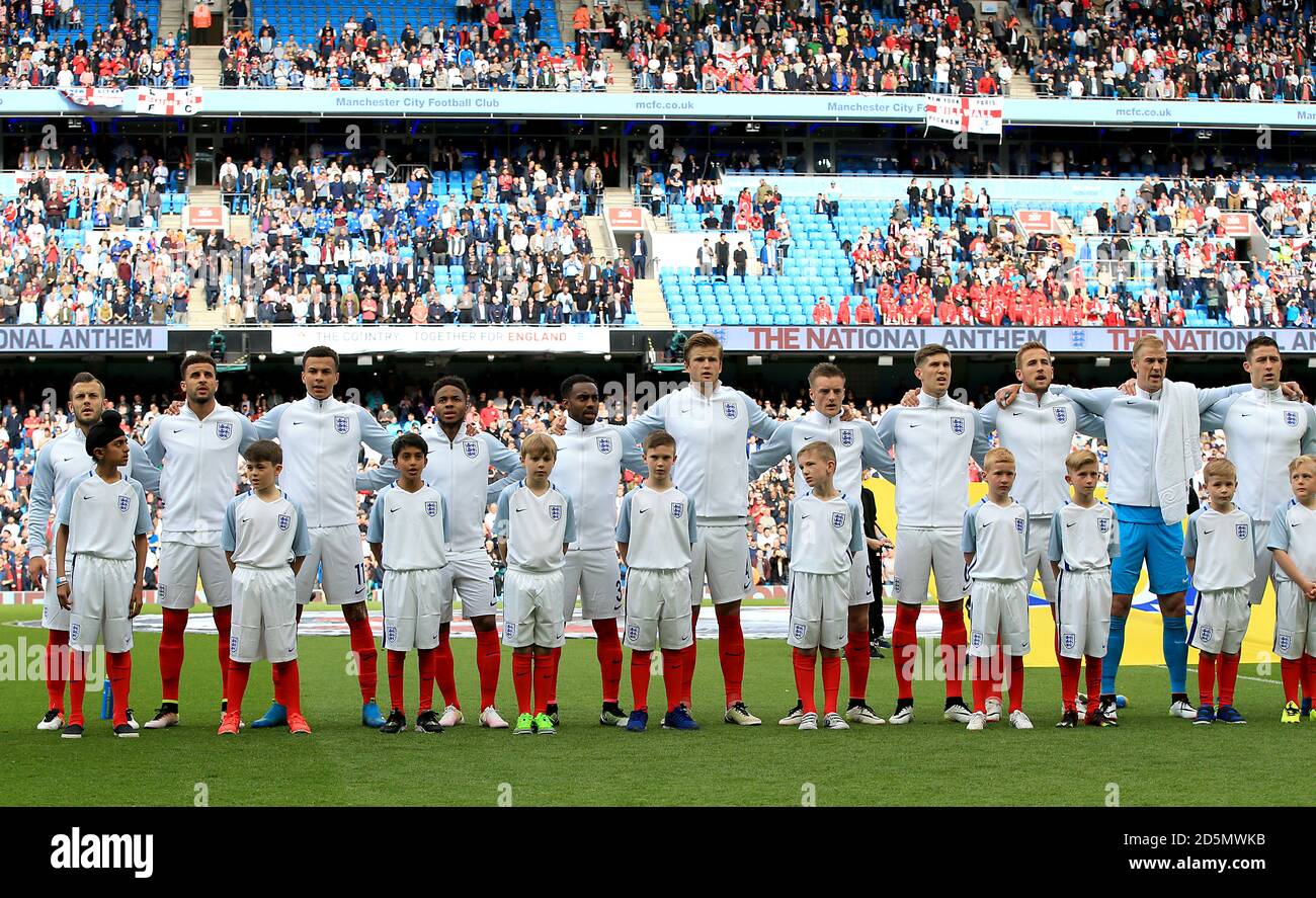 England team with mascots sing the national anthem prior to kick off ...