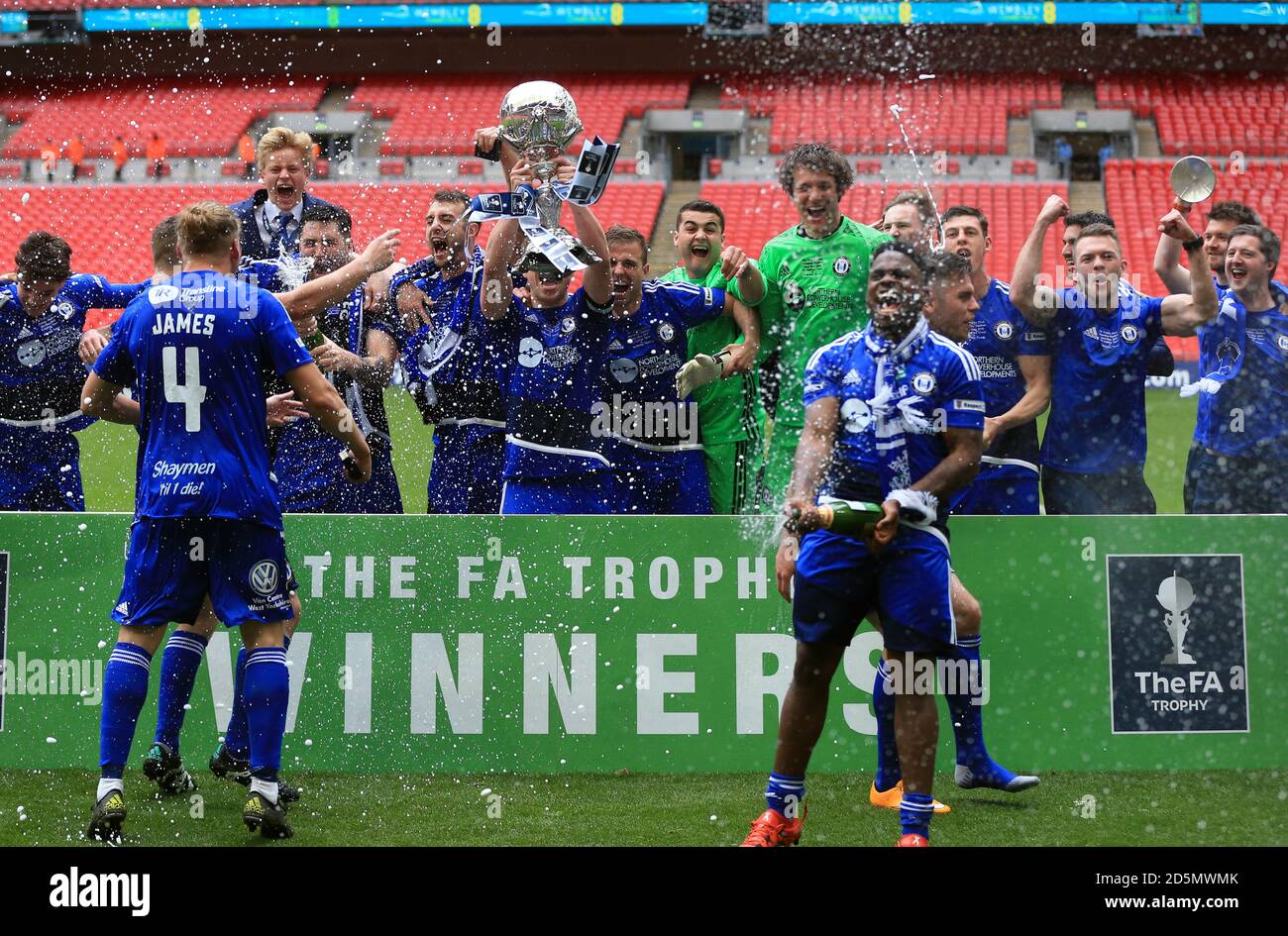 Halifax Town's Nicky Wroe celebrates lifting the trophy after the game ...