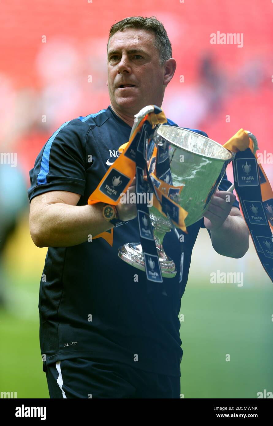 Morpeth Town's Manager Nicky Gray celebrates with the trophy Stock ...