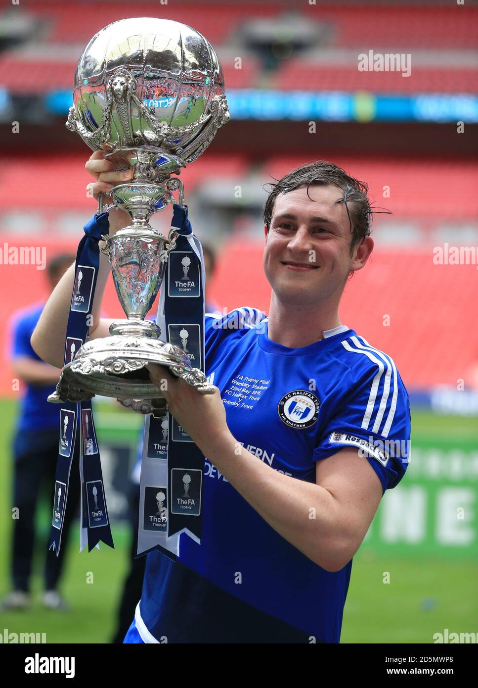 Halifax Town's Sam Walker celebrates with the trophy Stock Photo - Alamy