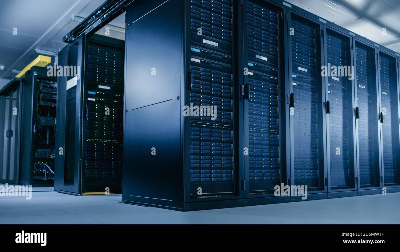 Low Angle Shot of Data Center With Multiple Rows of Fully Operational ...