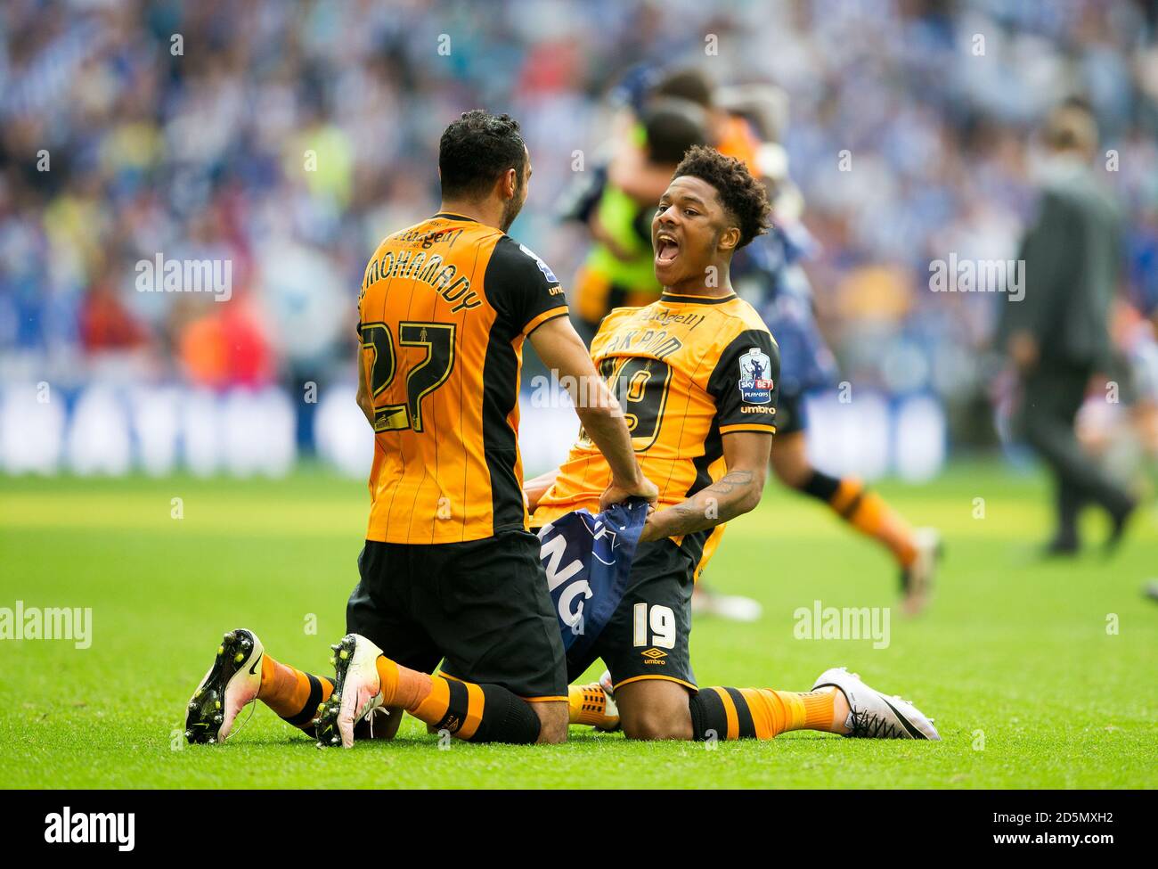 Hull City's Ahmed Elmohamady and Chuba Akpom celebrate after the final ...