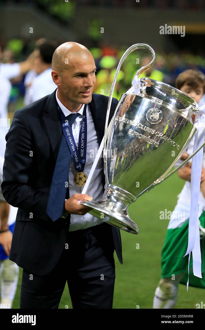 Real Madrid manager Zinedine Zidane celebrates with the UEFA Champions ...