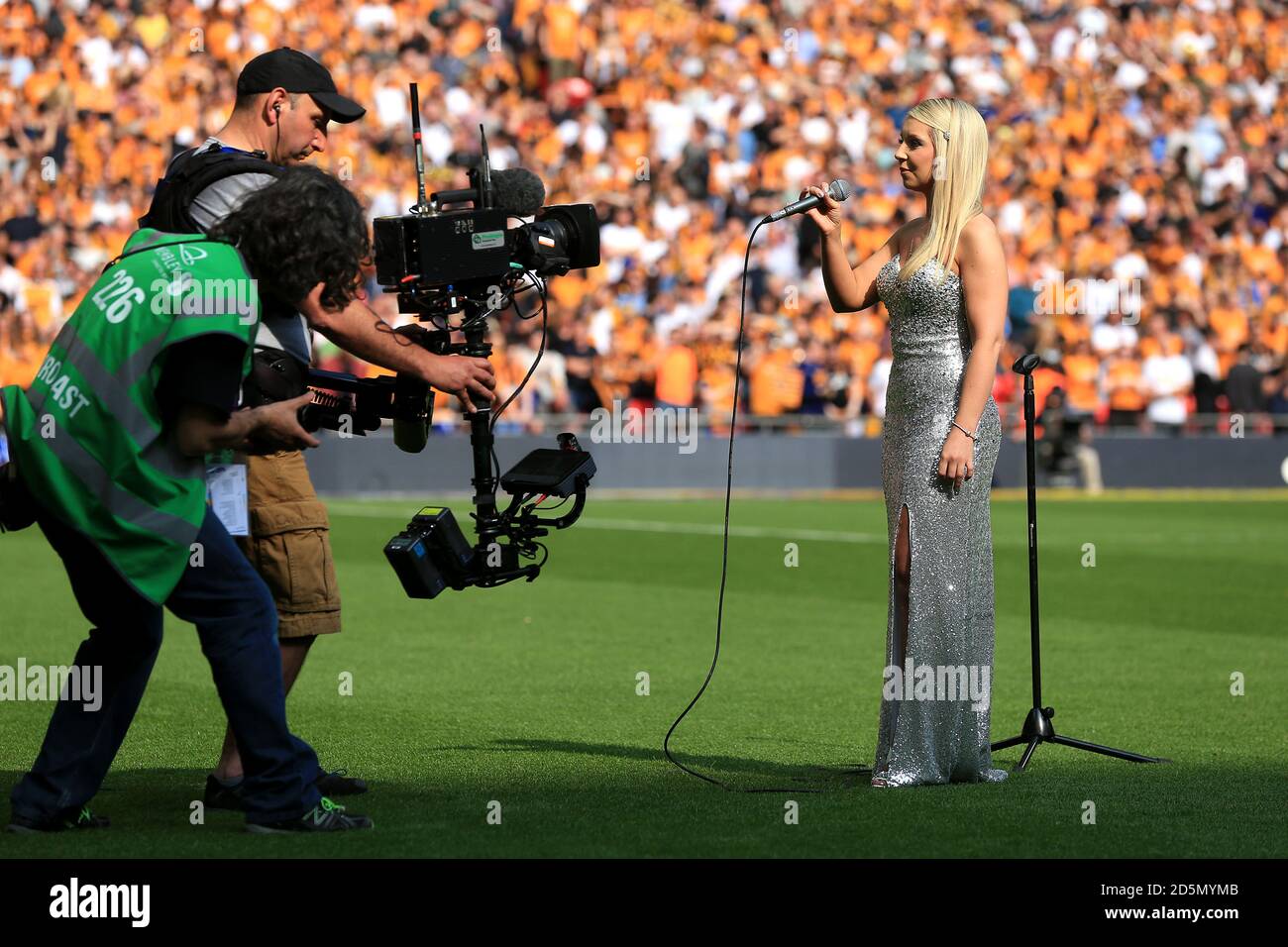 Soprano Emily Haig sings the national anthem before the game Stock ...
