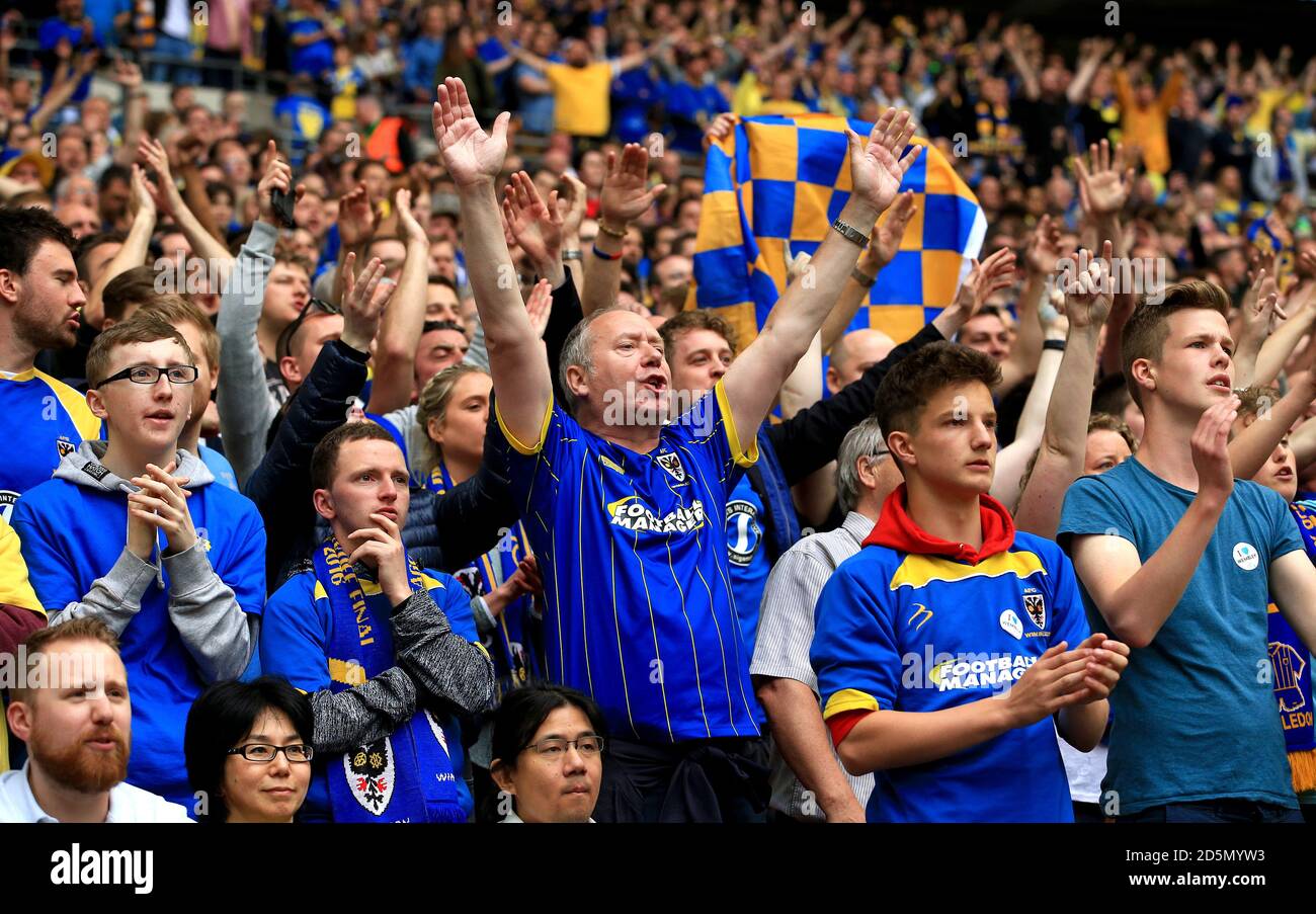 AFC Wimbledon fans show their support in the stands Stock Photo - Alamy
