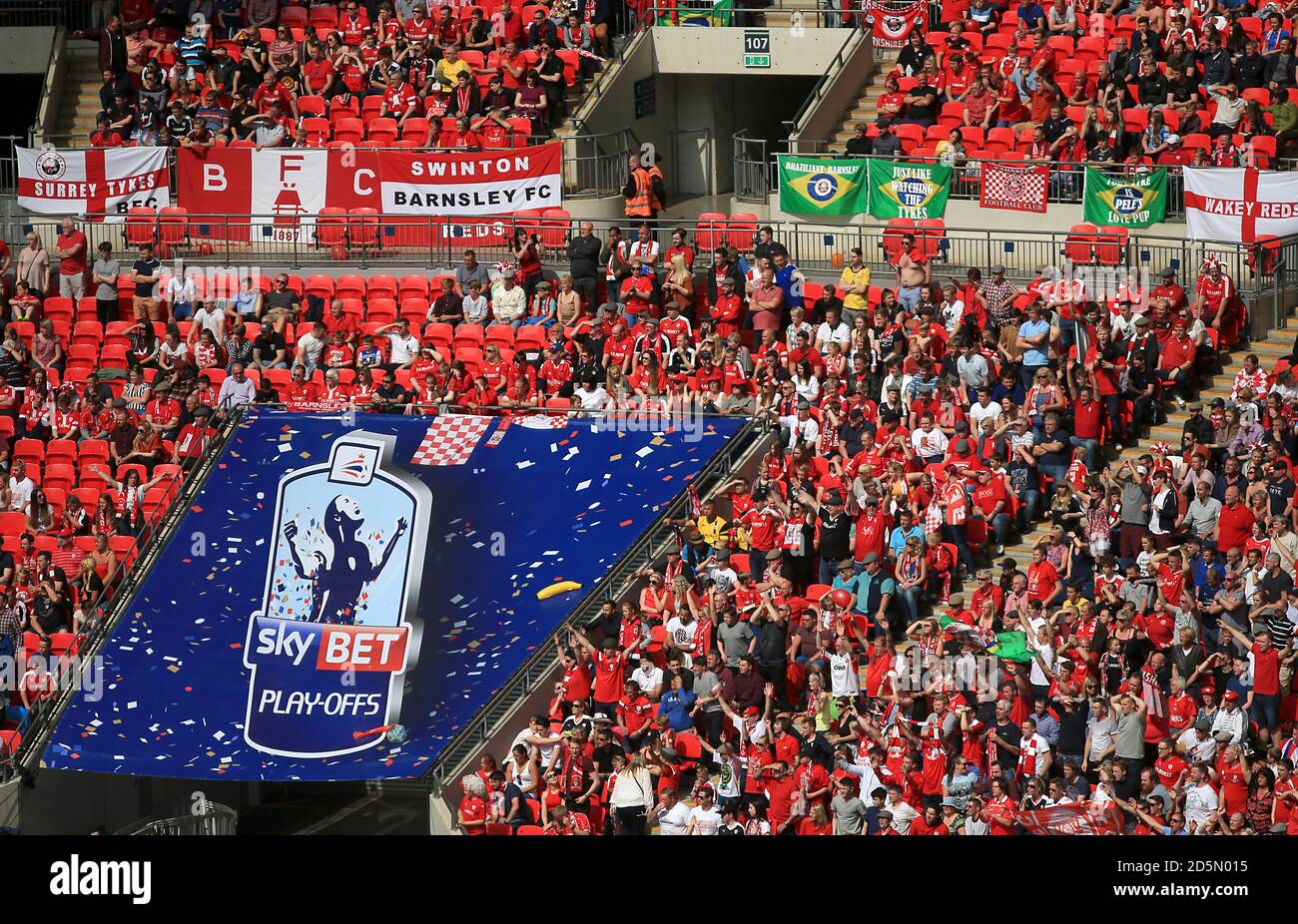 Barnsley fans cheer on their side from the stands Stock Photo - Alamy