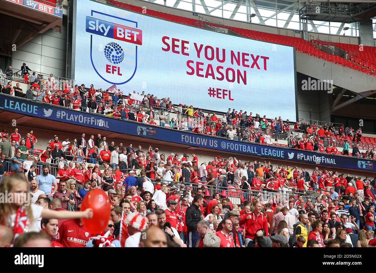 Barnsley fans cheer on their side from the stands Stock Photo - Alamy