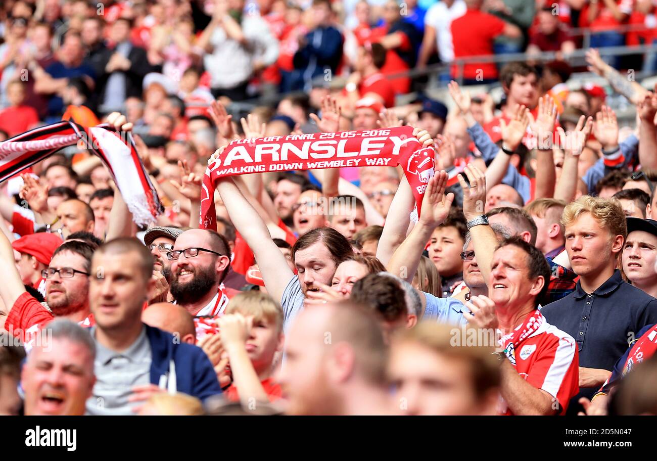 Barnsley fans cheer on their side from the stands Stock Photo - Alamy