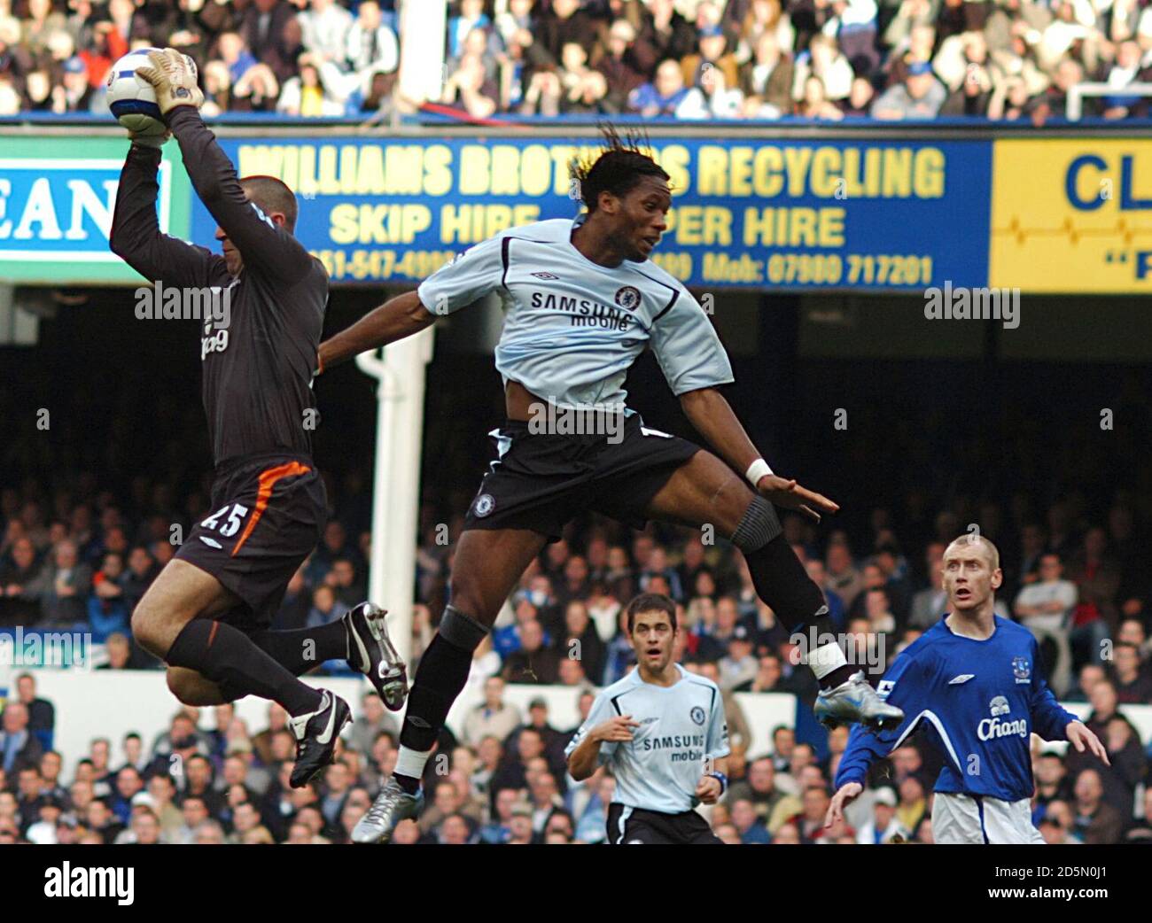 Everton goalkeeper Nigel Martyn saves from Chelsea's Didier Drogba ... Everton goalkeeper Nigel Martyn saves from Chelsea's Didier Drogba ...