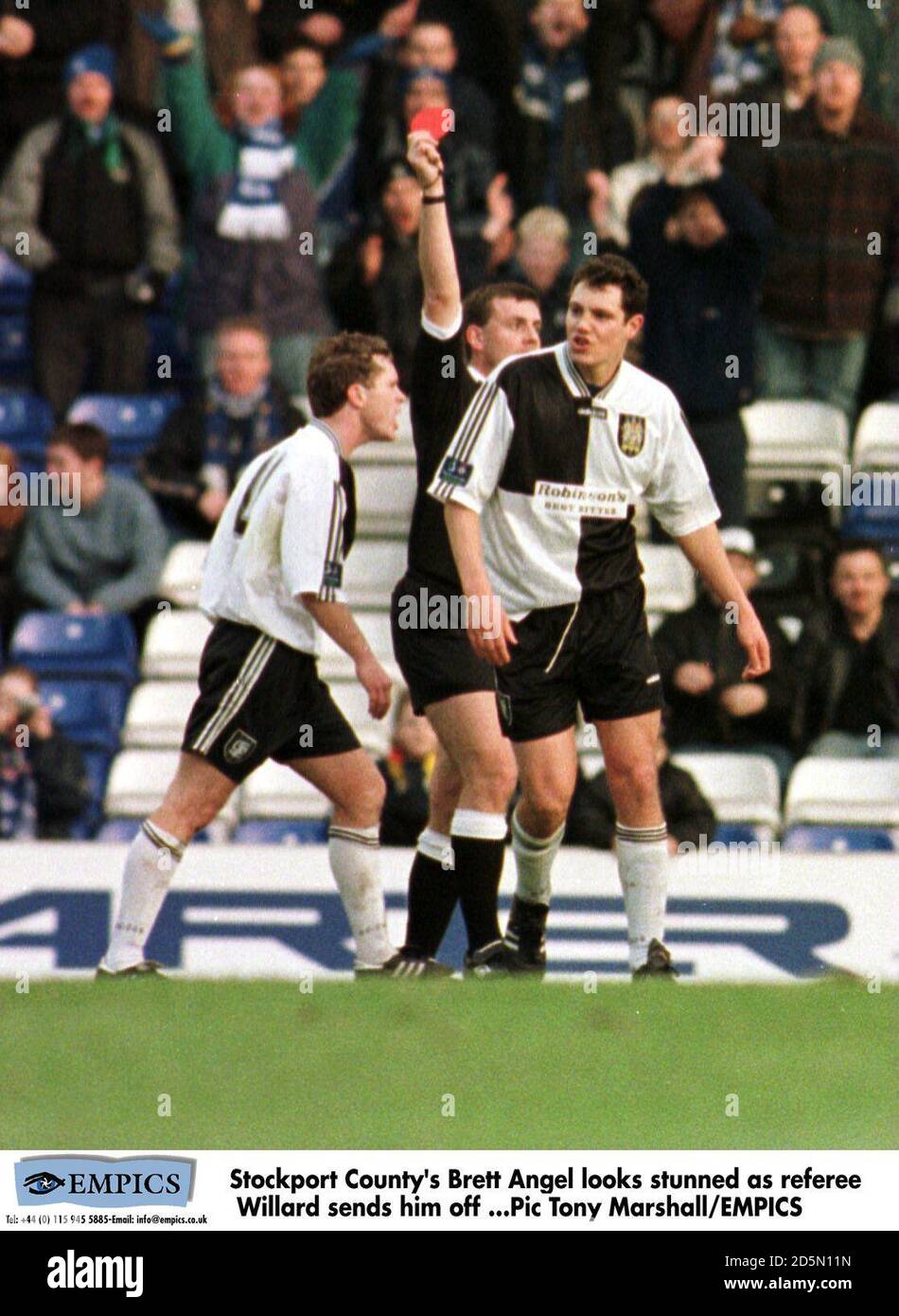 Stockport County's Brett Angel (right) looks stunned as referee Gary ...
