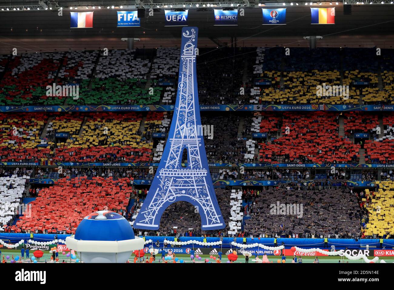 A general view of the stadium as fans with coloured cards create a ...