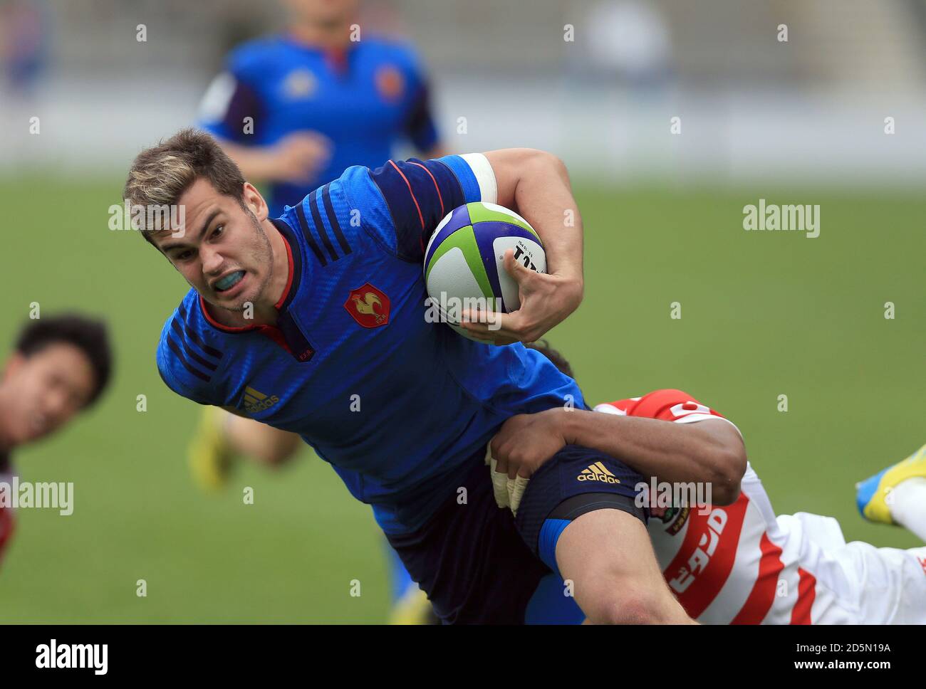 France's Damian Penaud dives over the try line to score his sides ...