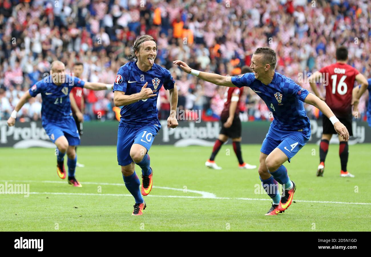 Croatia's Luka Modric (centre) celebrates scoring his sides first goal ...