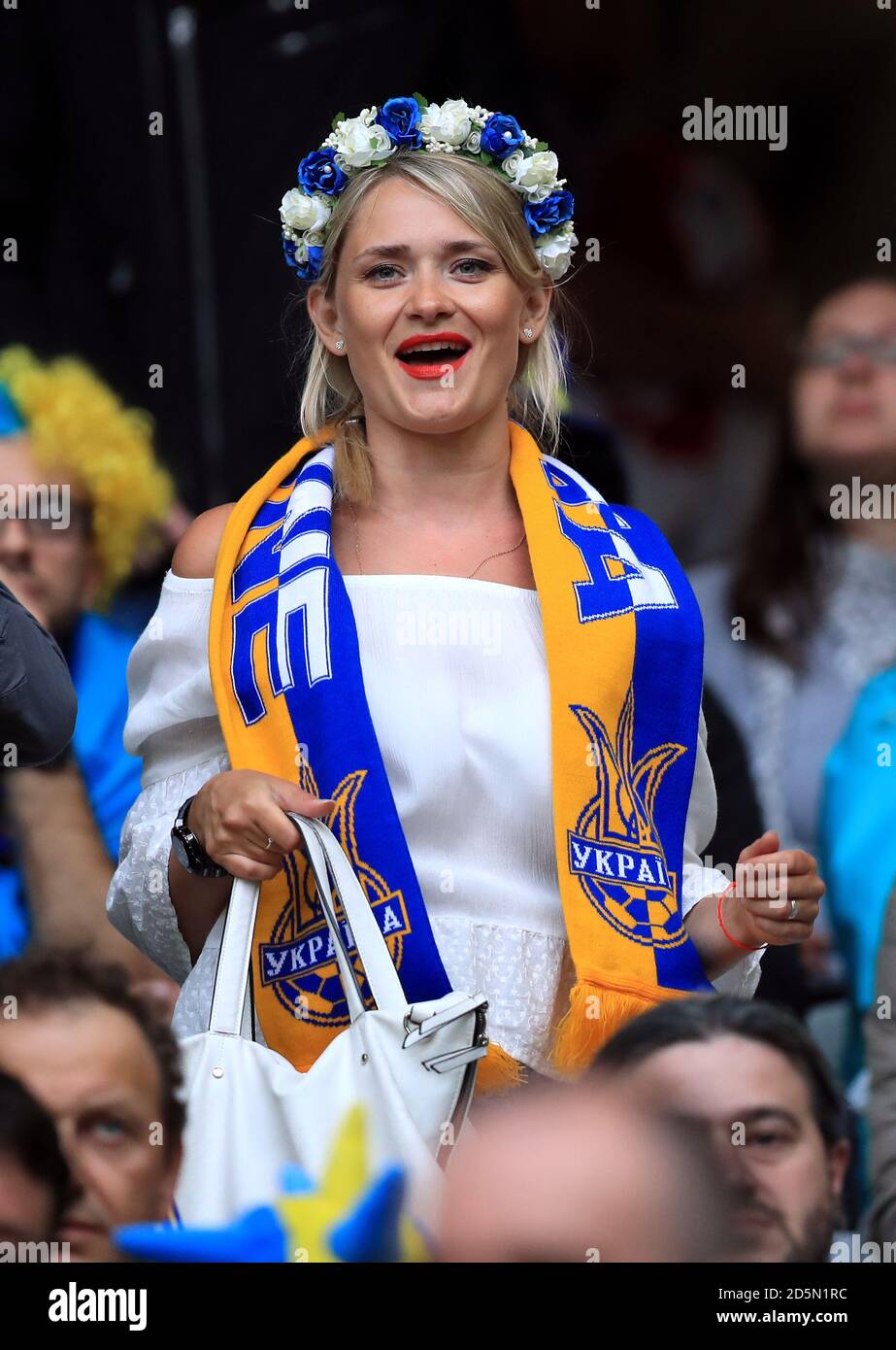 A Ukraine fan in the stands Stock Photo - Alamy