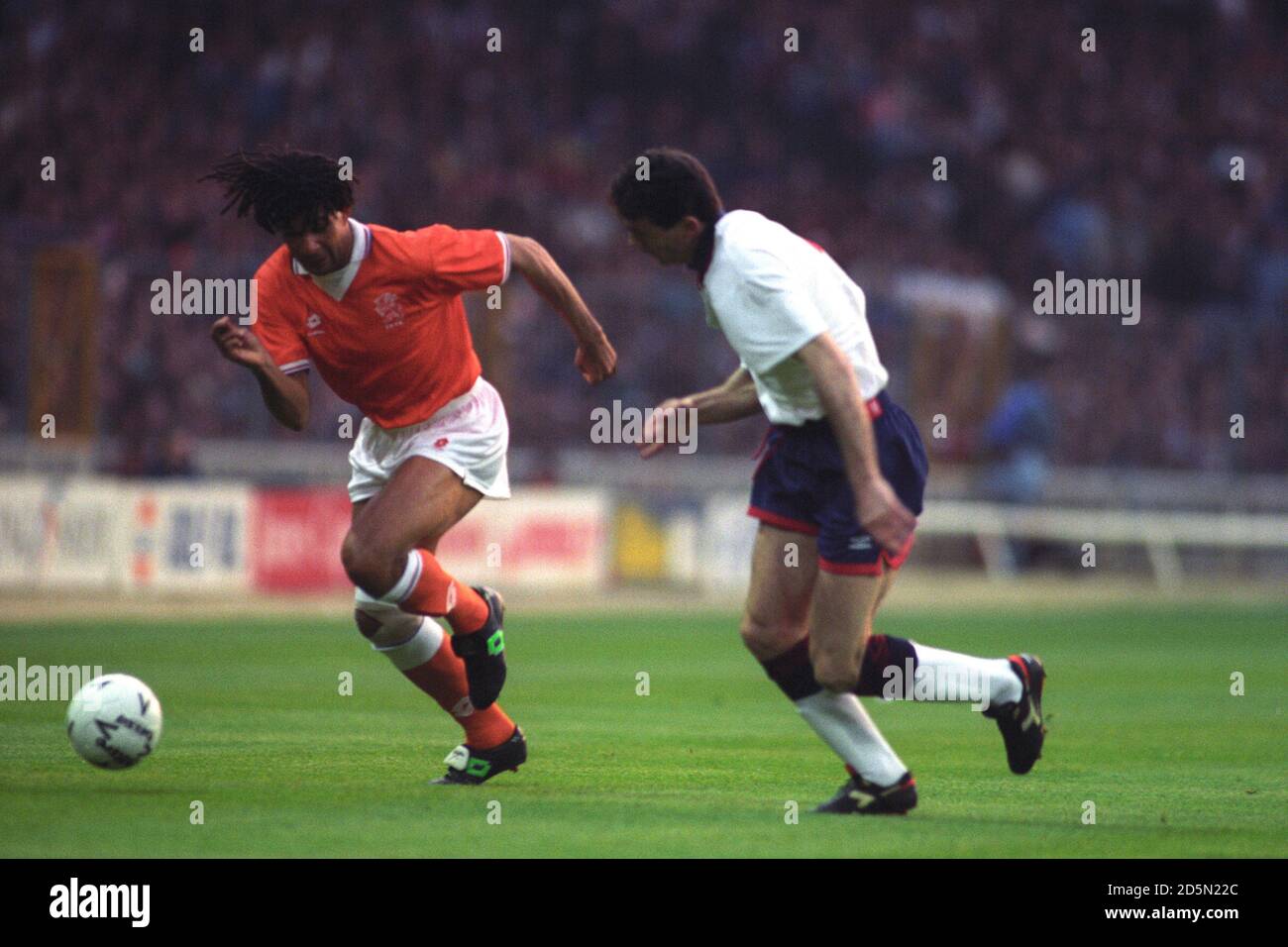 (L-R) Ruud Gullit, Netherlands, and Martin Keown, England Stock Photo ...