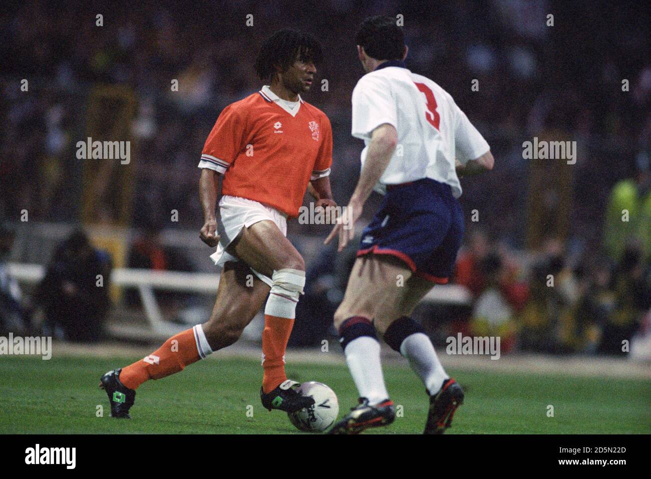 (L-R) Ruud Gullit, Netherlands, and Martin Keown, England Stock Photo ...