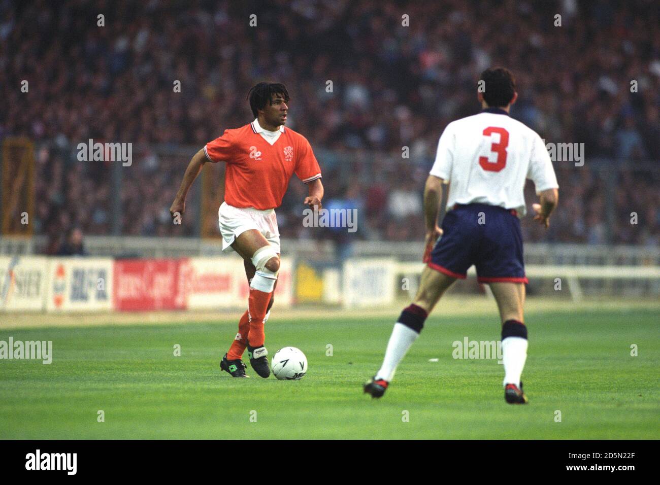 (L-R) Ruud Gullit, Netherlands, and Martin Keown, England Stock Photo ...