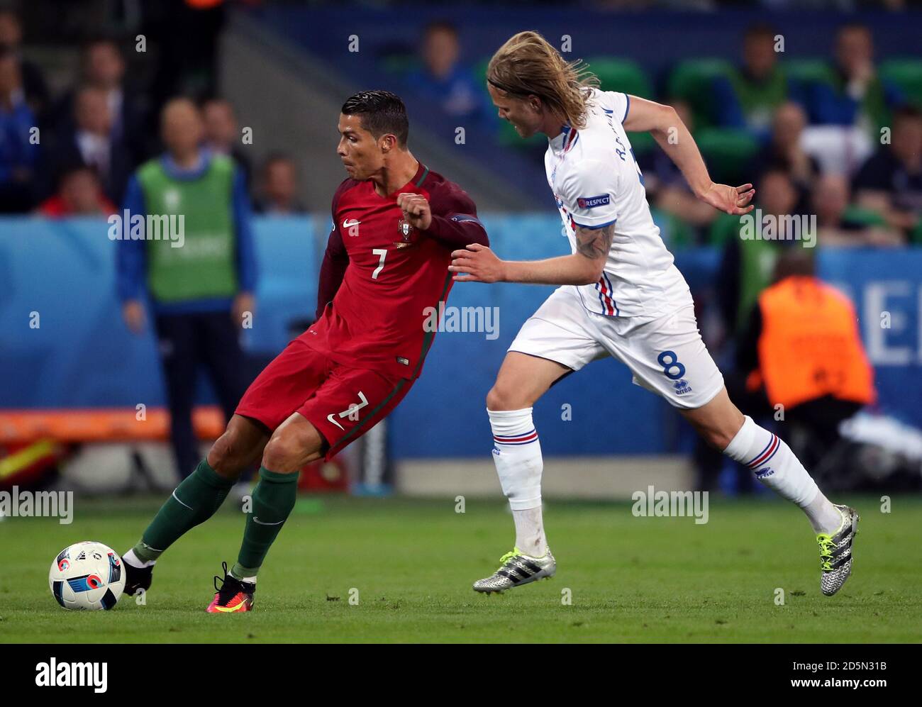Portugal's Cristiano Ronaldo crosses under pressure from Iceland's ...