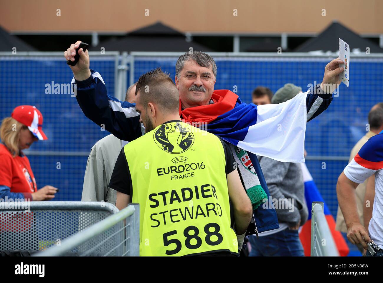 Fans are frisked as they enter the stadium Stock Photo - Alamy