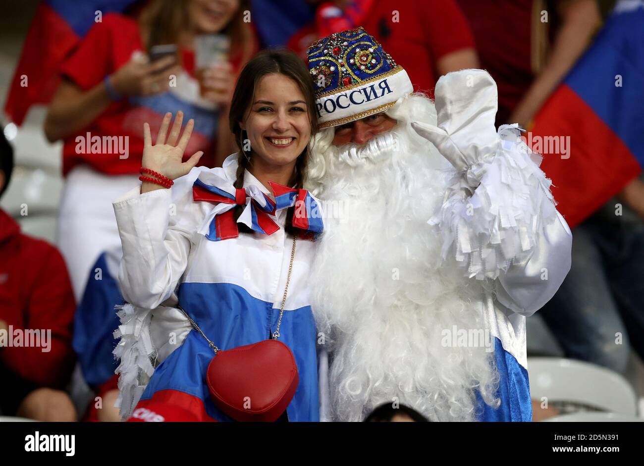 Russia fans in fancy dress show support for their team Stock Photo - Alamy