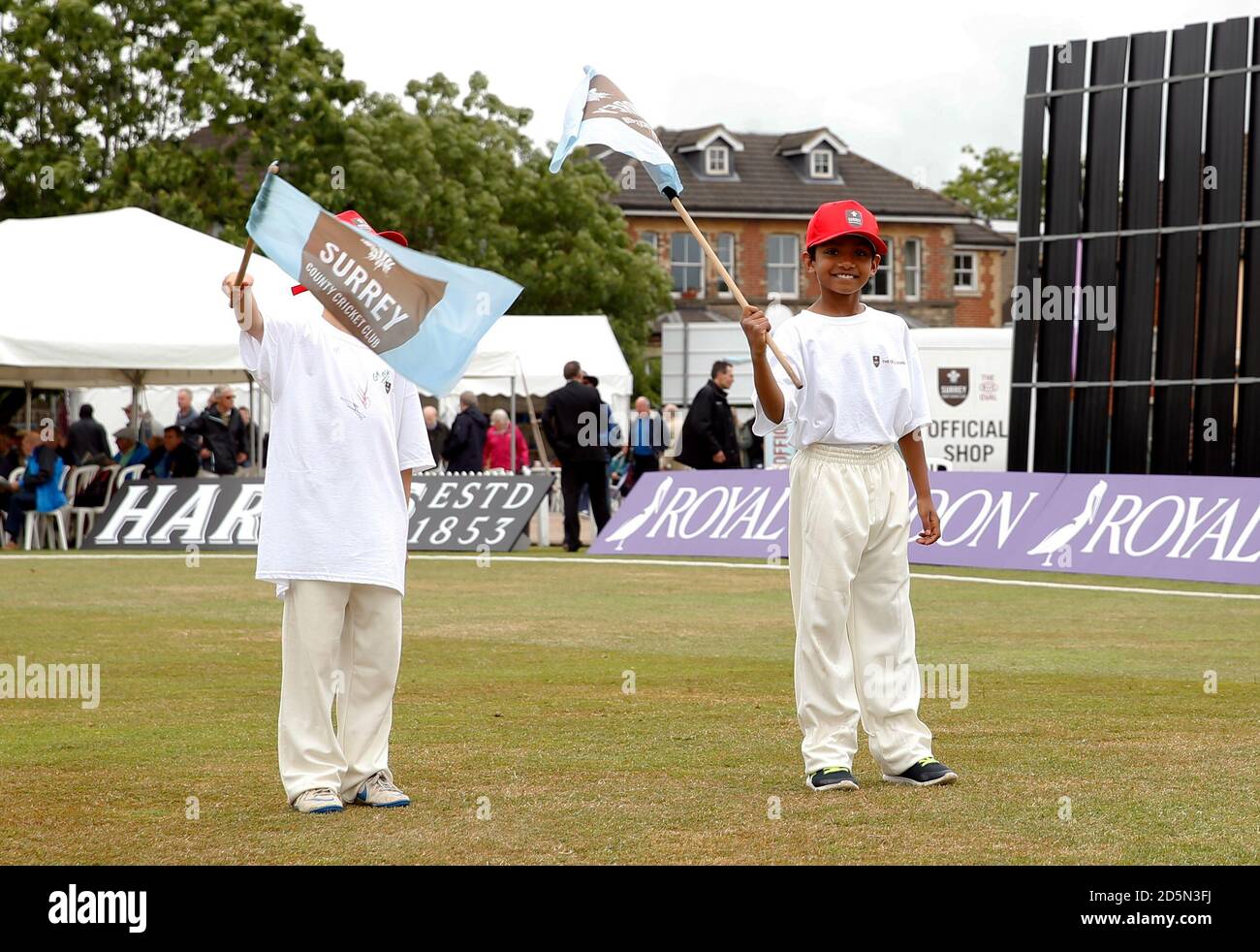Mascots form a guard of honour before the game Stock Photo - Alamy