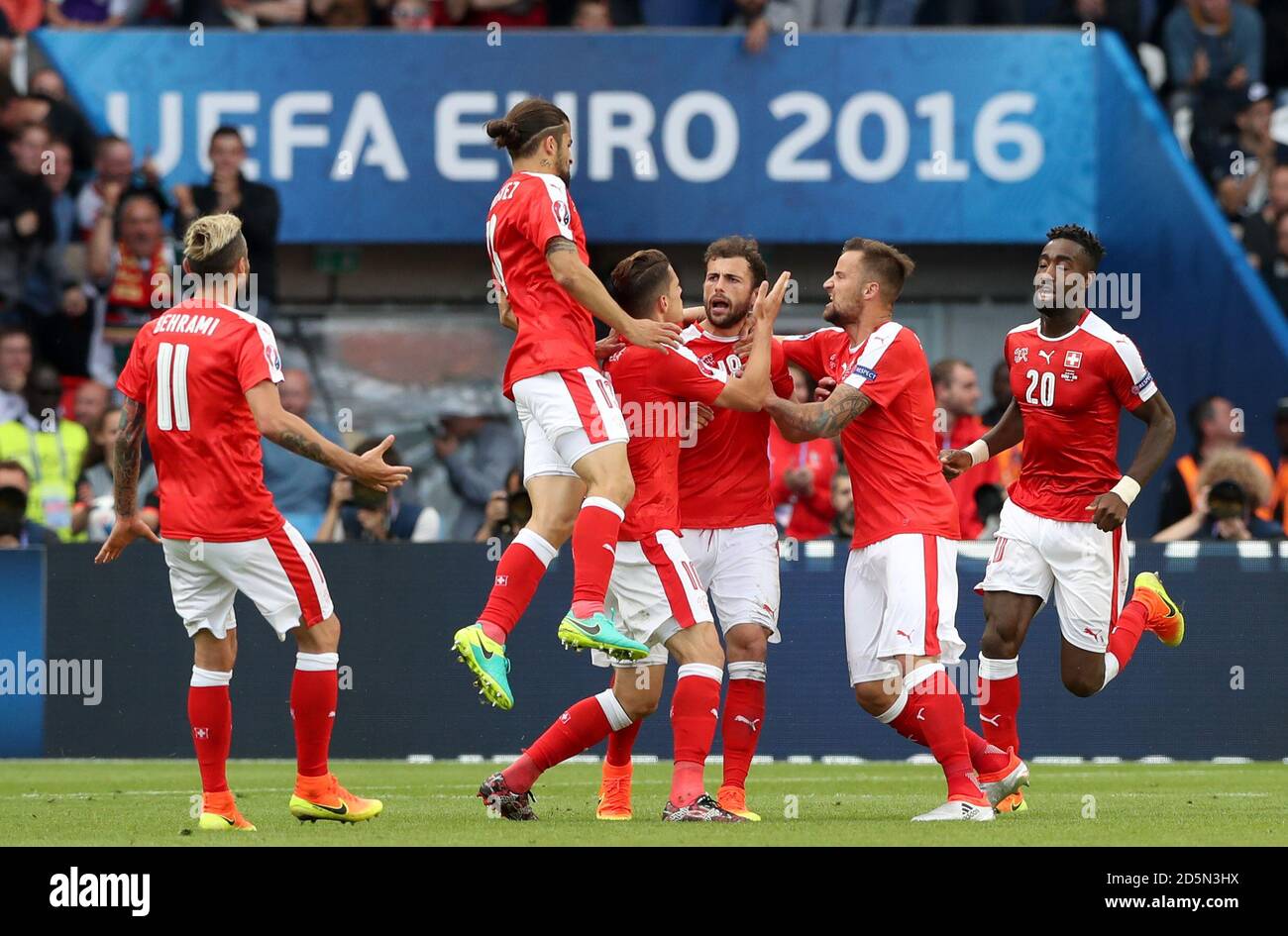 Switzerland's Admir Mehmedi (centre) celebrates scoring his side's ...