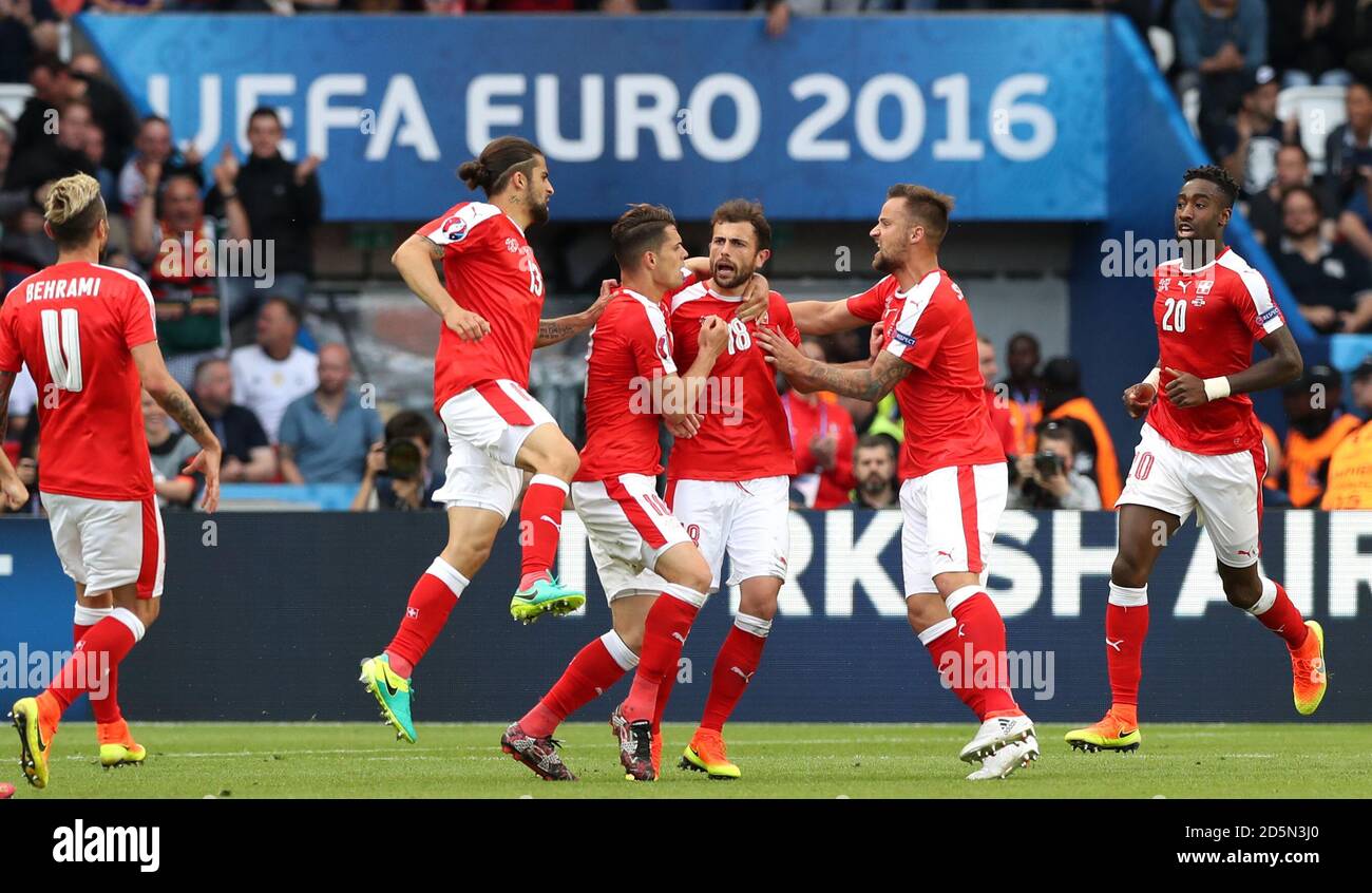 Switzerland's Admir Mehmedi (centre) celebrates scoring his side's ...