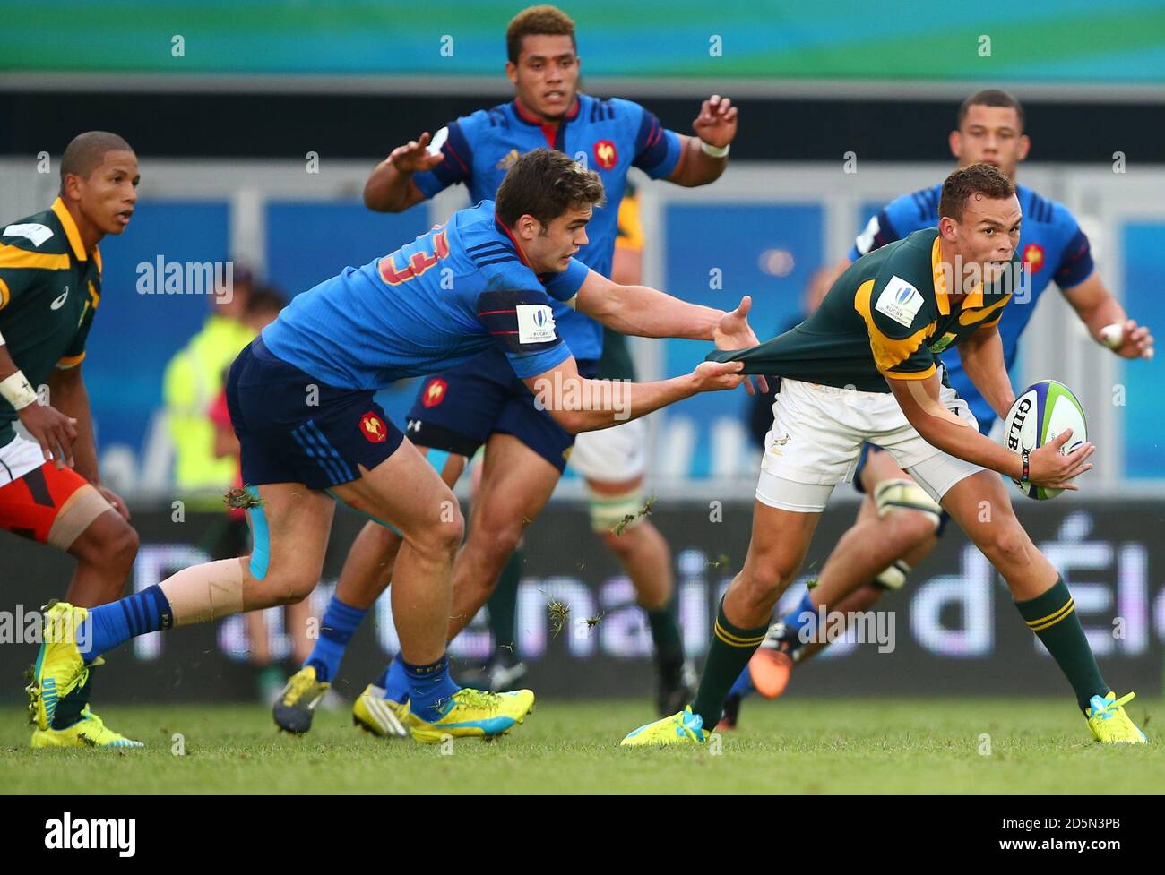 South Africa's Cirwin Bosch (right) is tackled by France's Damian ...