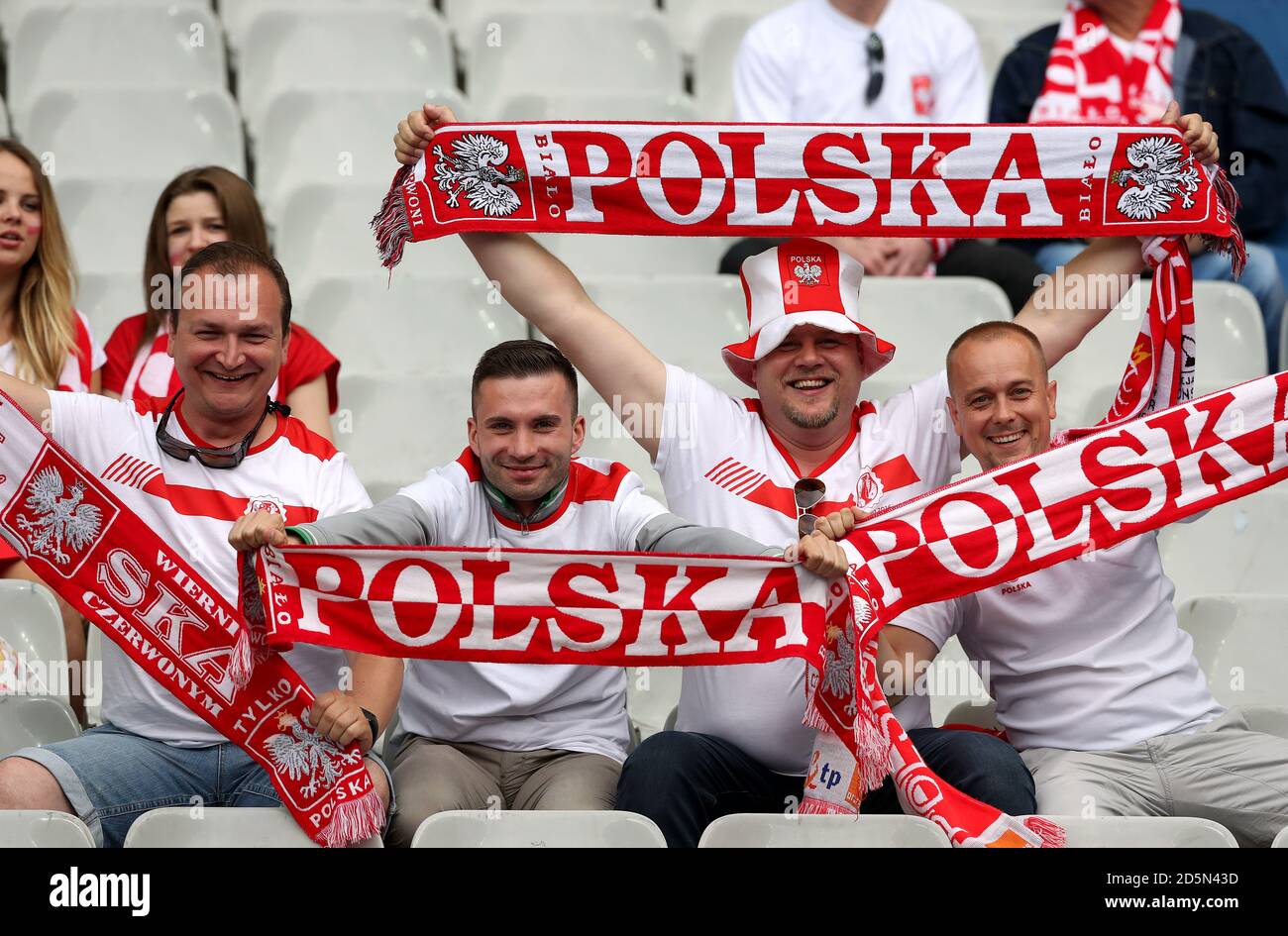 Poland fans show support for their team in the stands Stock Photo - Alamy