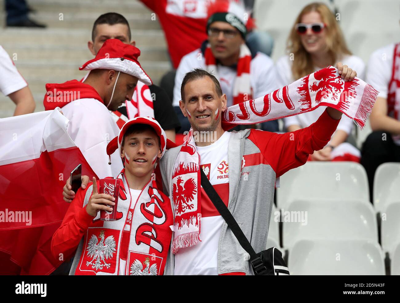 Poland fans show support for their team in the stands hi-res stock ...