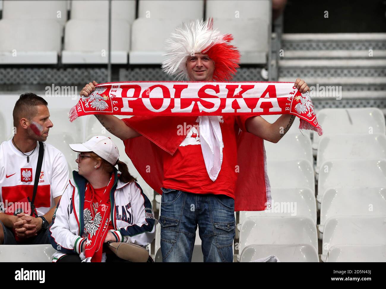 Poland fans show support for their team in the stands Stock Photo - Alamy