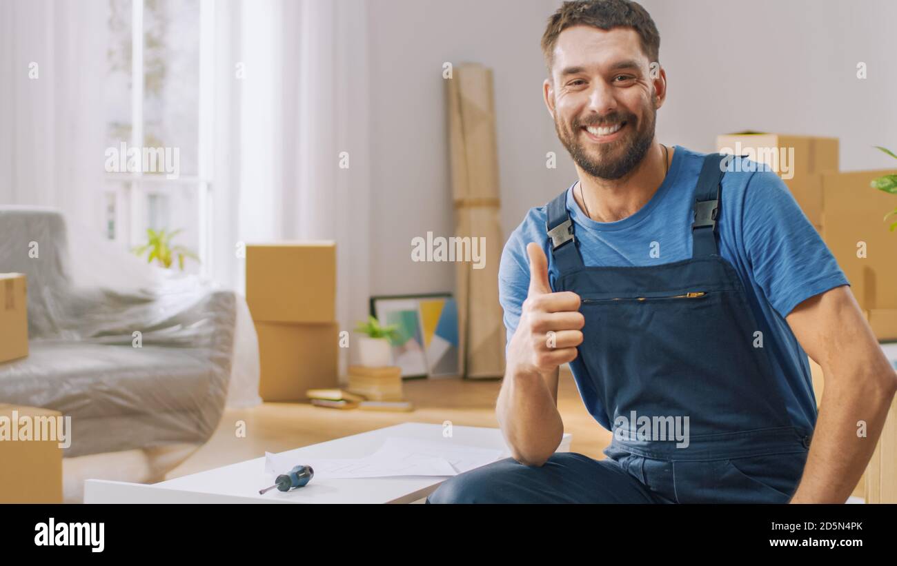 Successful Furniture Assembly Worker Finishes Assembling Shelf and ...